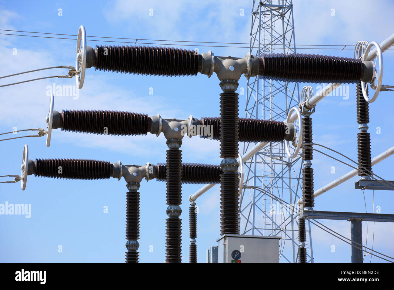 Powerline towards blue sky Stock Photo - Alamy