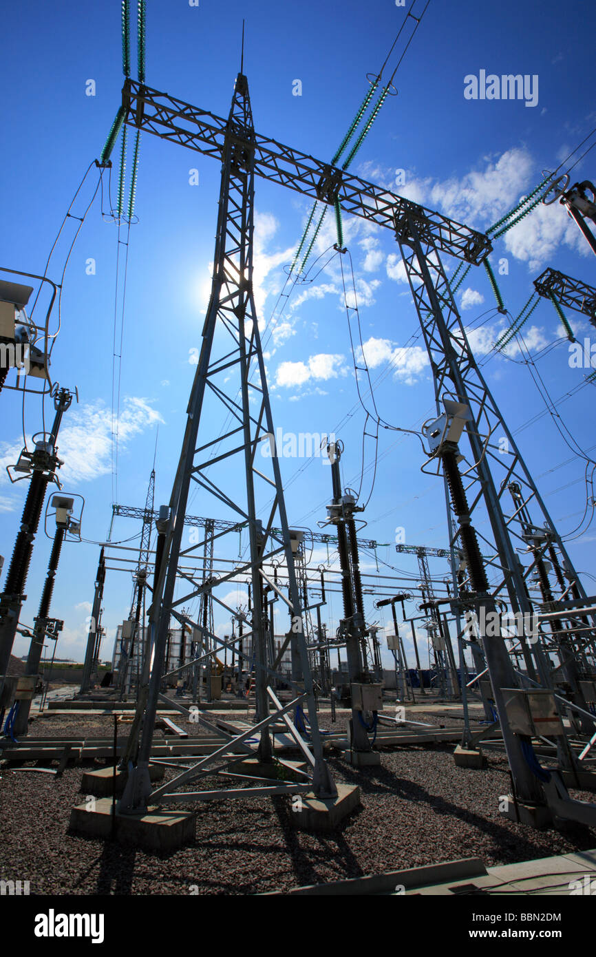 Powerline towards blue sky Stock Photo - Alamy
