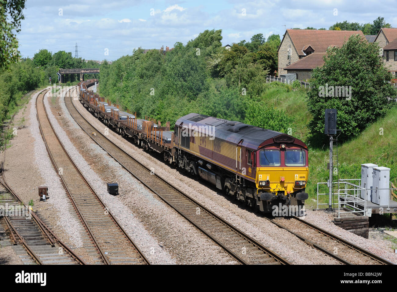 A freight train hauling a load of steel Stock Photo - Alamy