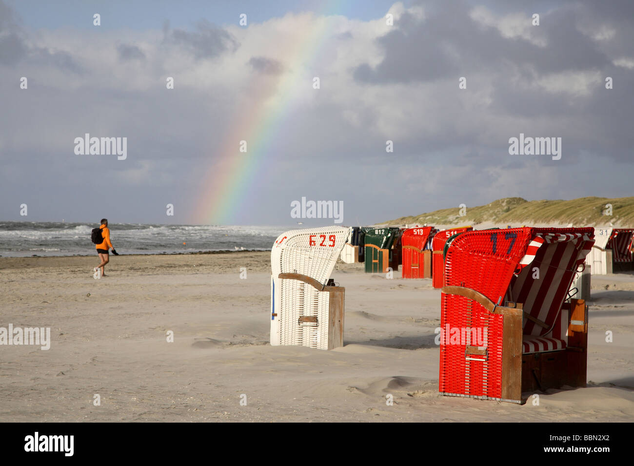 Beach chairs and rainbow Stock Photo - Alamy