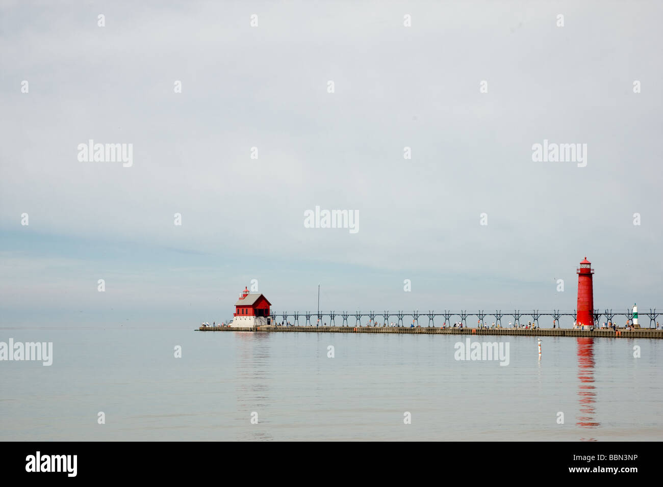 The Pier at Grand Haven contains two red lighthouses built in 1875 and ...