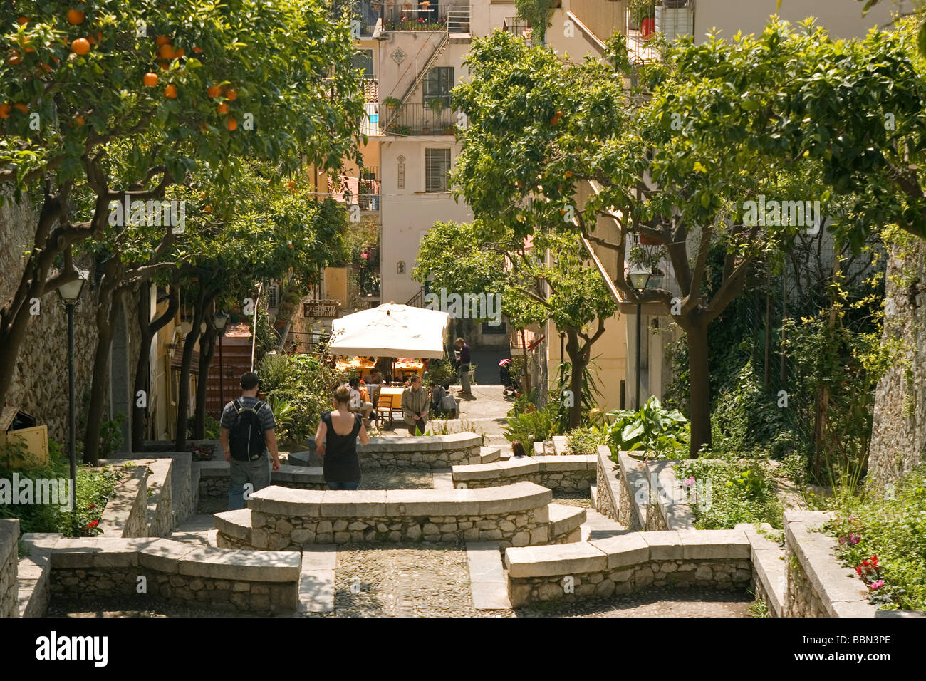 Restaurant cafe on stone stairs Taormina Sicily Italy Stock Photo - Alamy