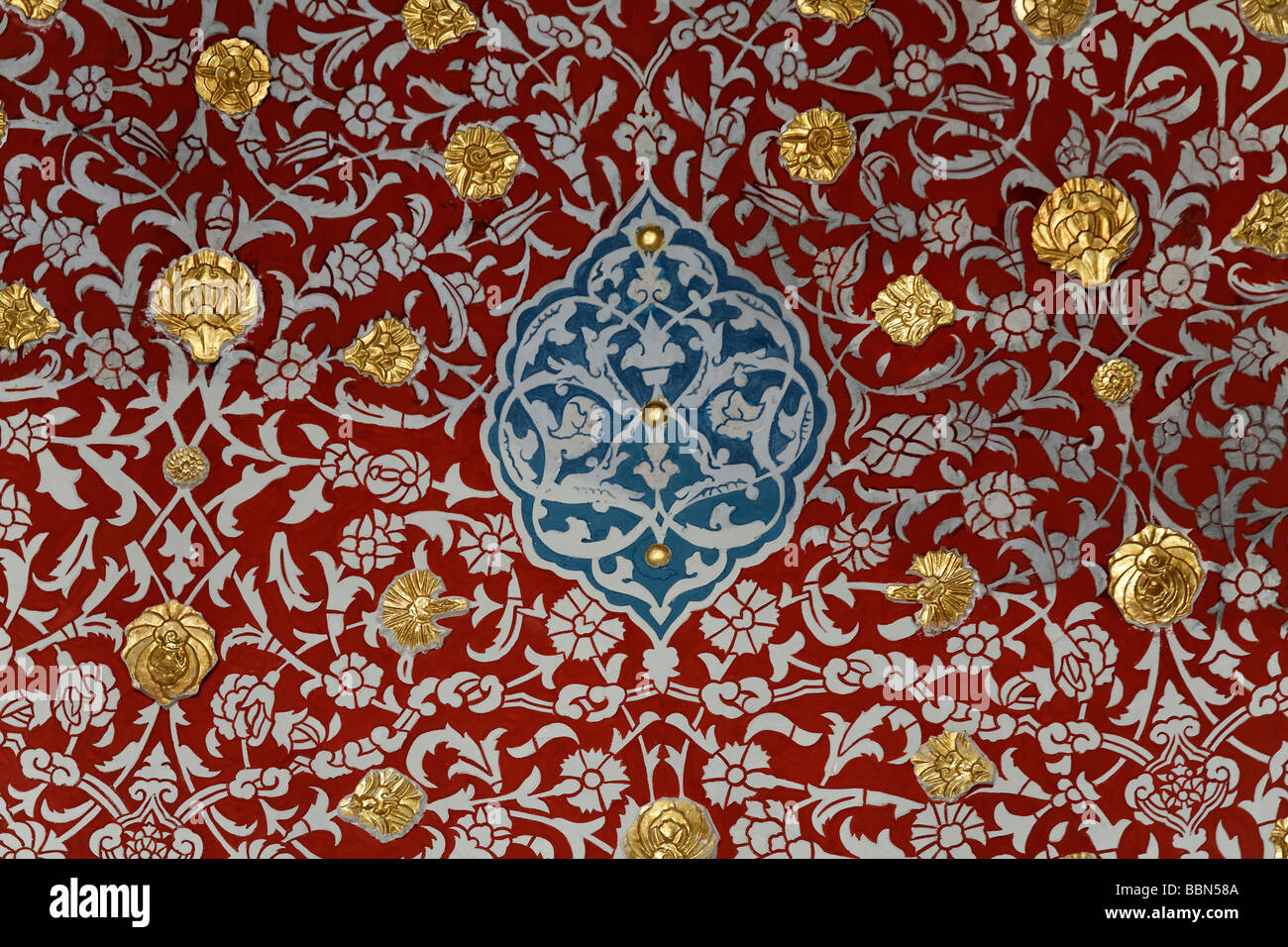 Dome painted with gold applications and arabesque patterns, artful ...