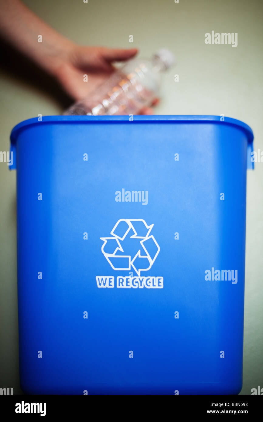 Woman dropping bin hi-res stock photography and images - Alamy