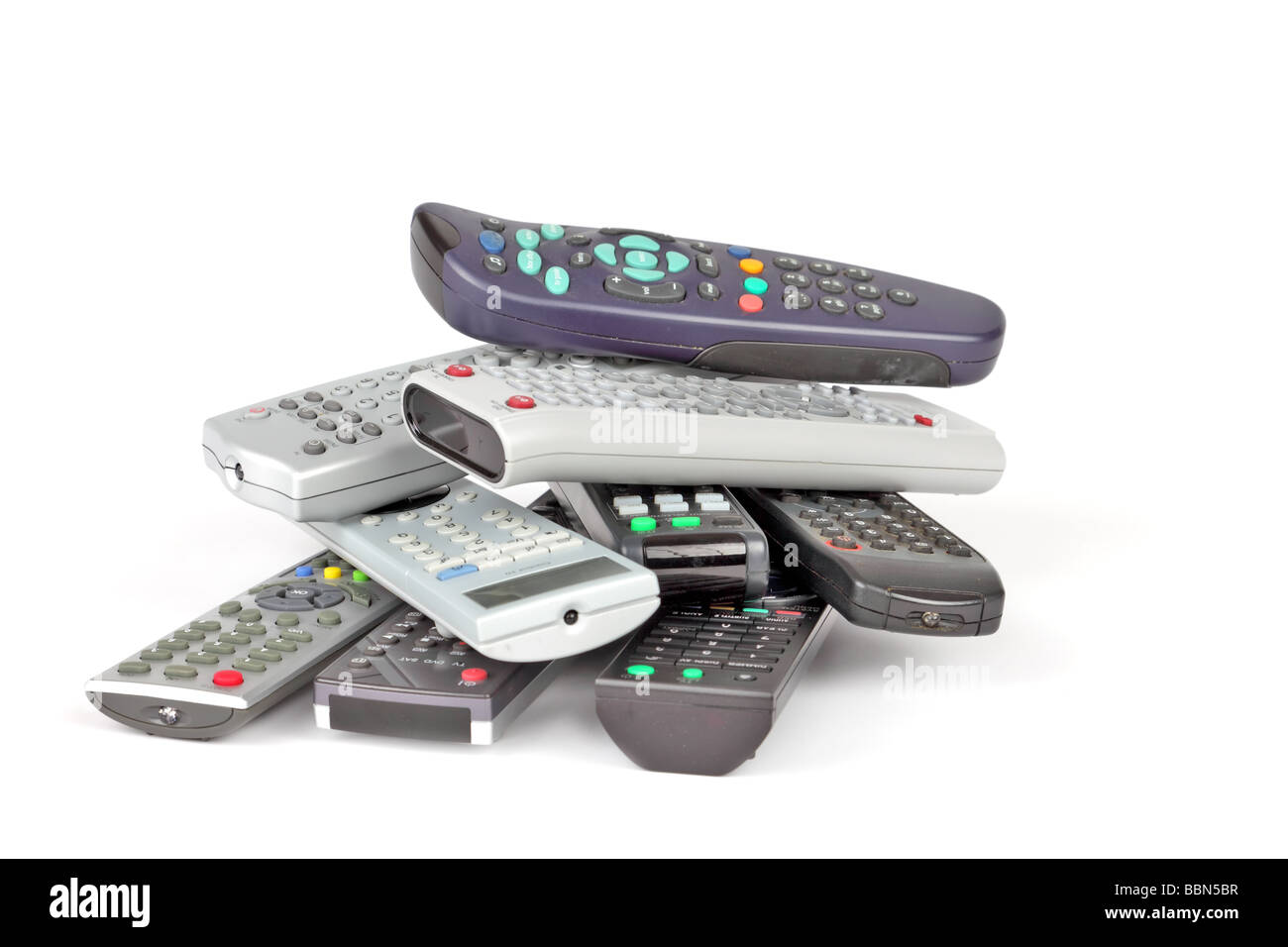 Many remote controls stacked showing various technologies Stock Photo ...