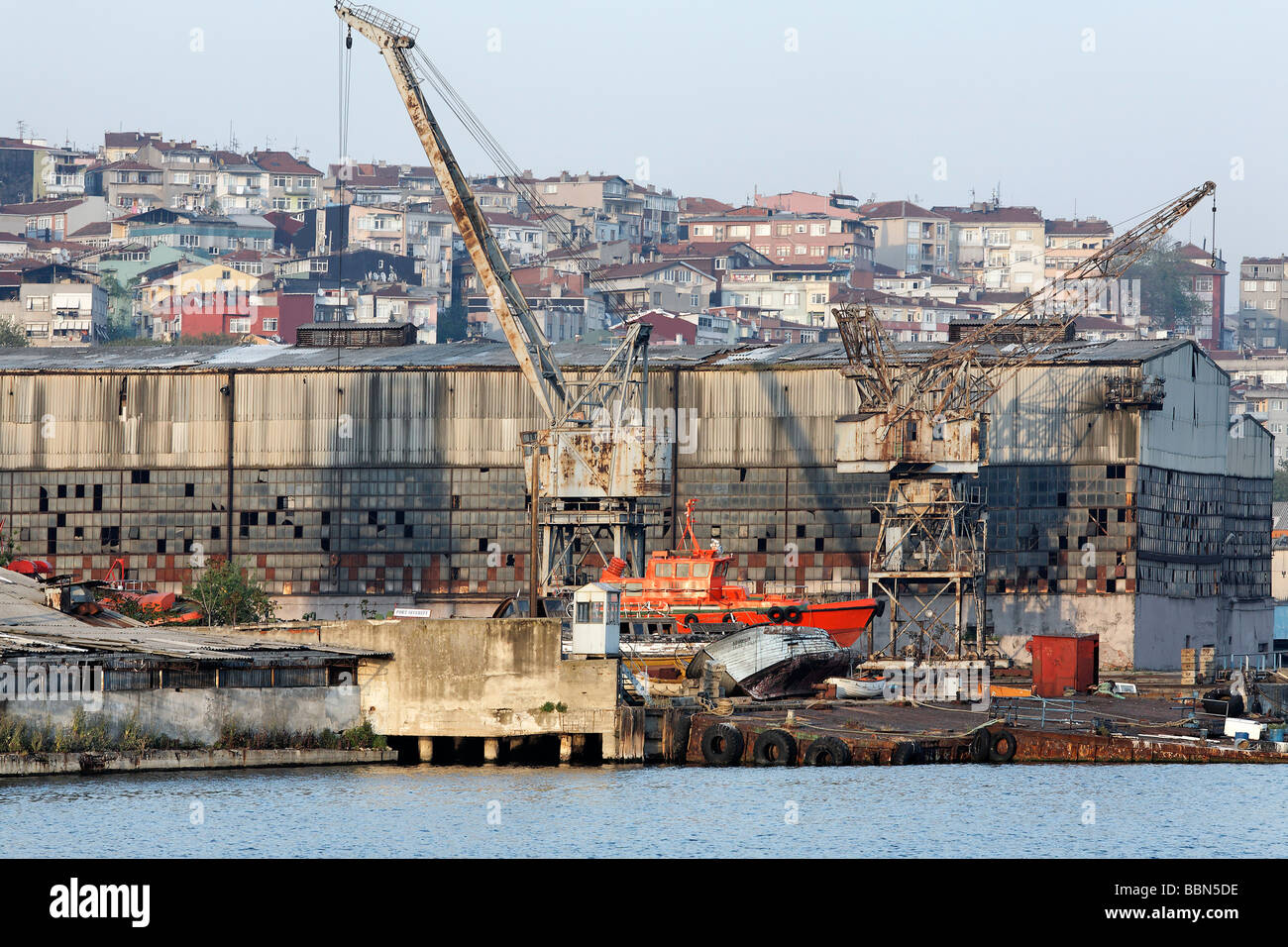 Disused shipyard on the banks of the Golden Horn, dilapidated docks ...