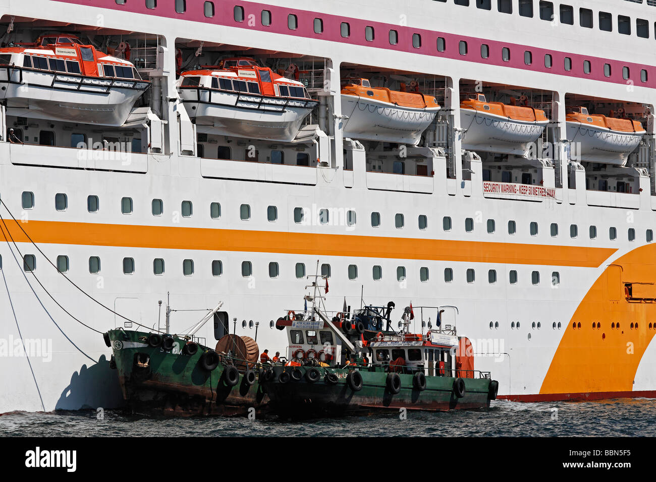 Ship's side of the cruise ship Celebrity Solisitce, lifeboats in the ...