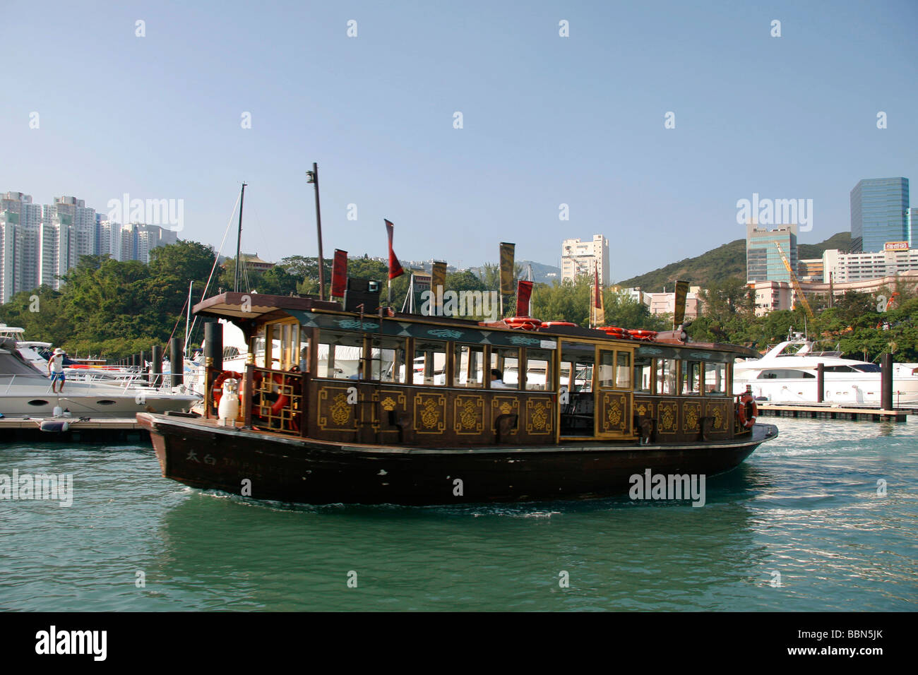 Ferries to Tai Pak and Jumbo Kingdom, Floating Restaurant, skyscrapers ...