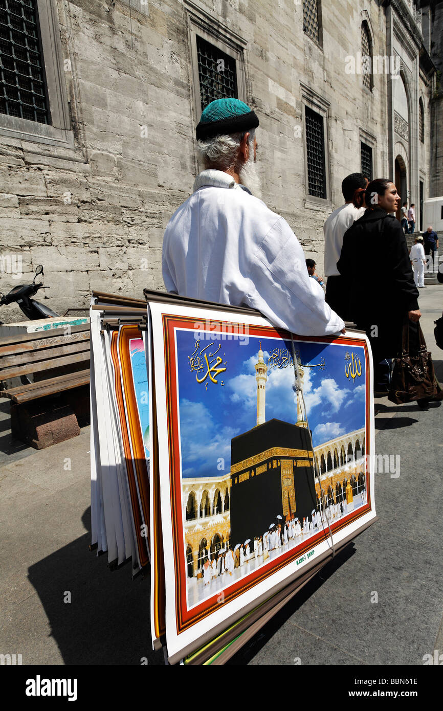 Bearded Turk carries posters with the picture of the Kaaba for sale ...