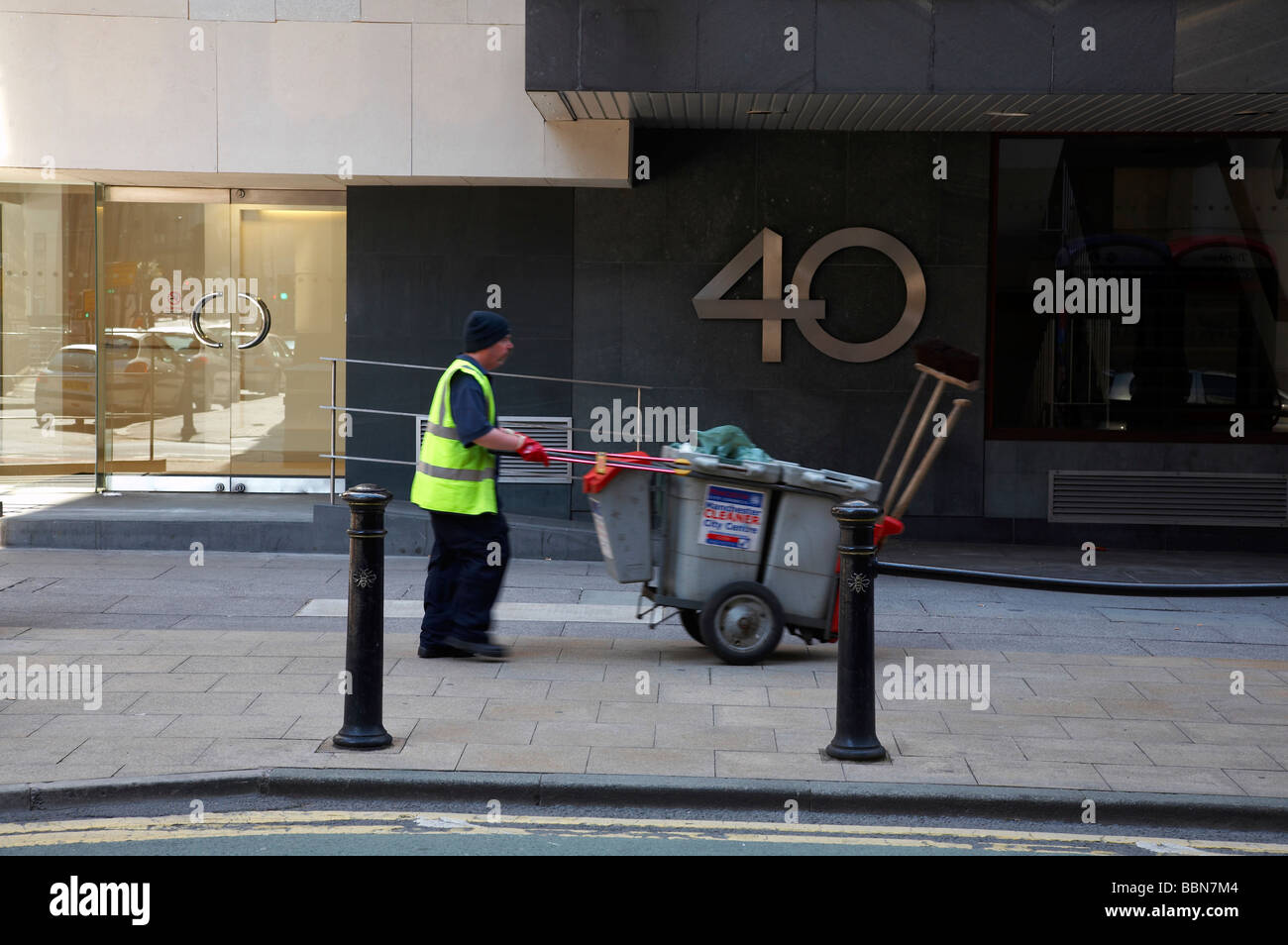 Street cleaner in Manchester city centre Stock Photo - Alamy