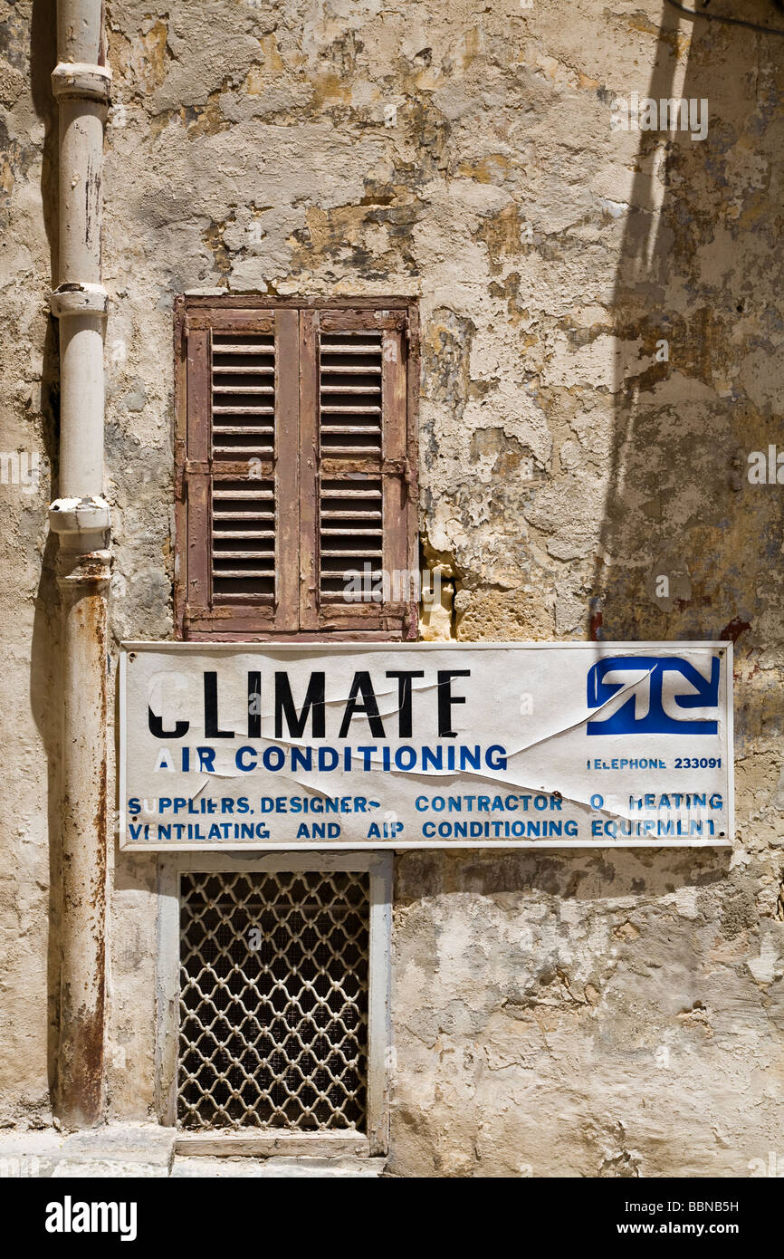 Climate Air Conditioning signage on a stucco wall in Valletta, Malta ...