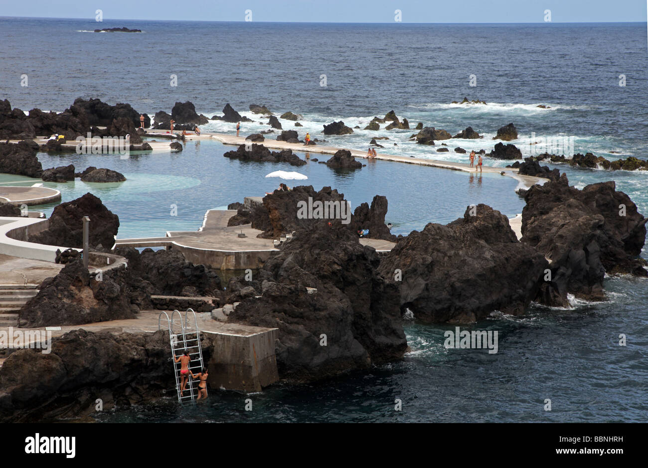 Natural ocean side volcanic swimming pool Porto Moniz Madeira Stock ...
