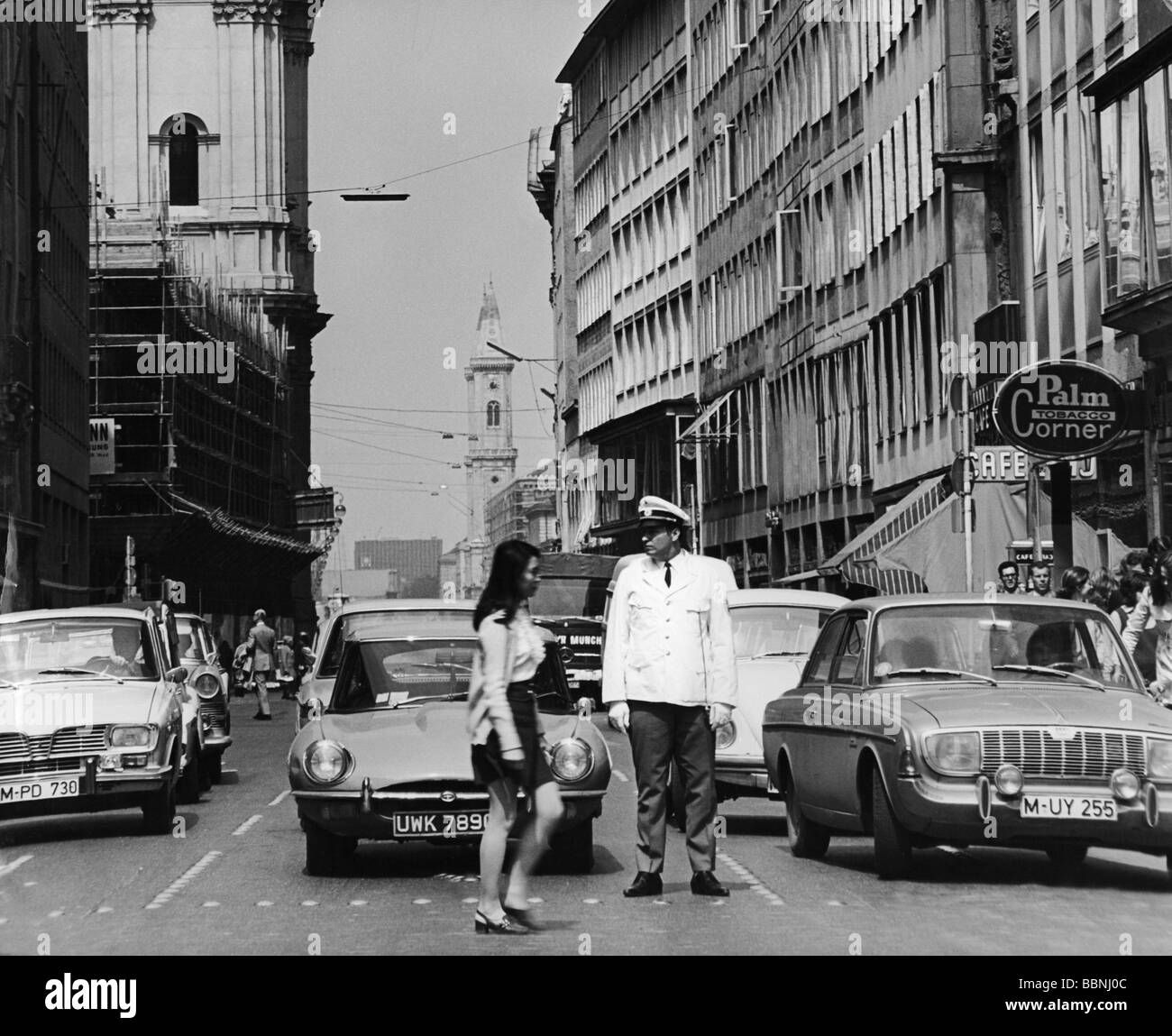 Germany, Munich, traffic, policeman regulating traffic ...