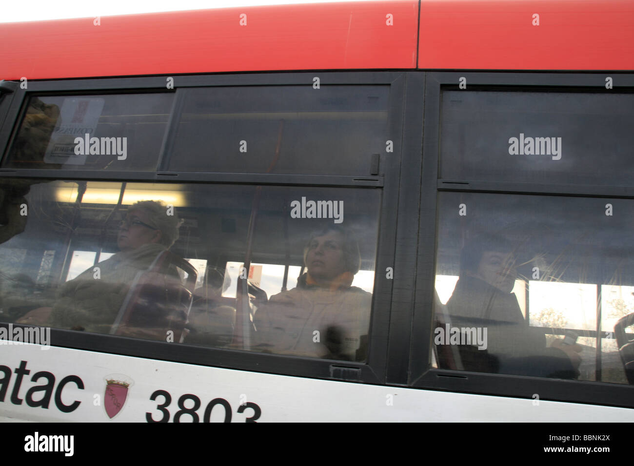 people on fast public transport bus in rome italy Stock Photo - Alamy