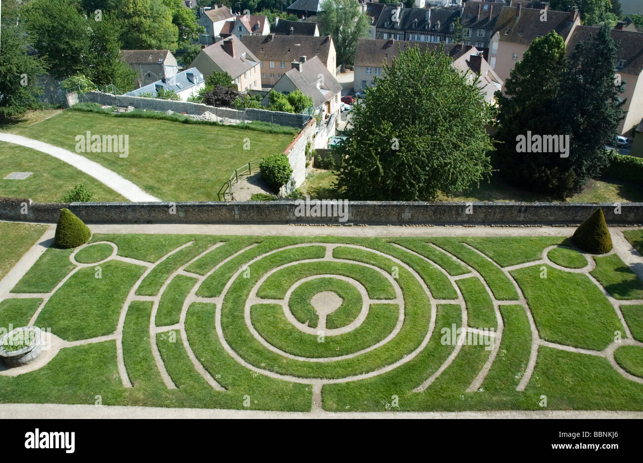 A maze cut into a lawn at Chartres, France, echoing the famous maze on ...