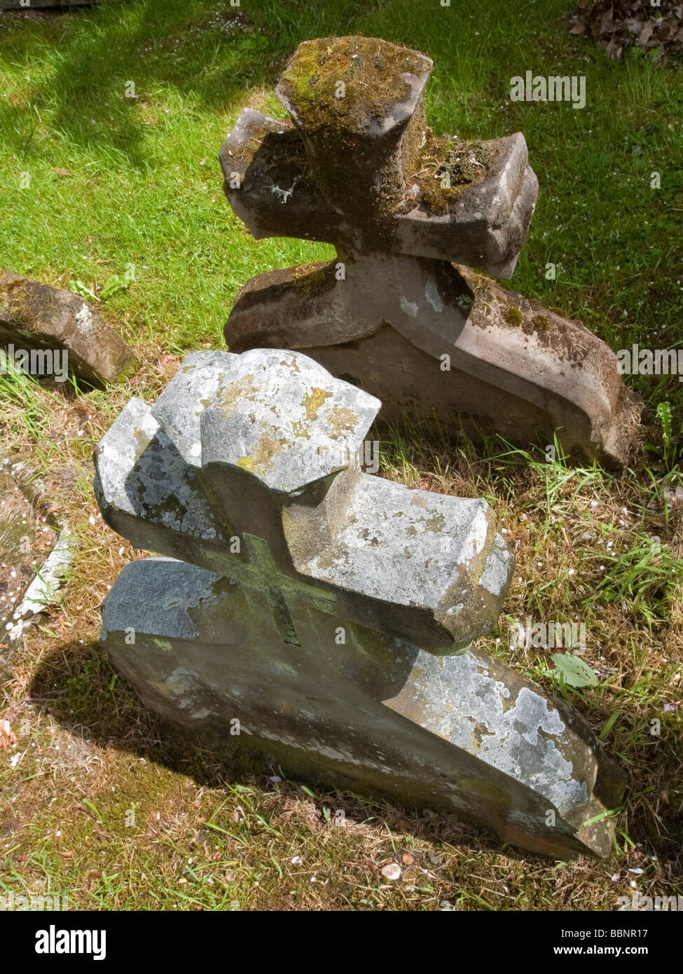 gravestones lit by the sun in a country cemetery Stock Photo - Alamy