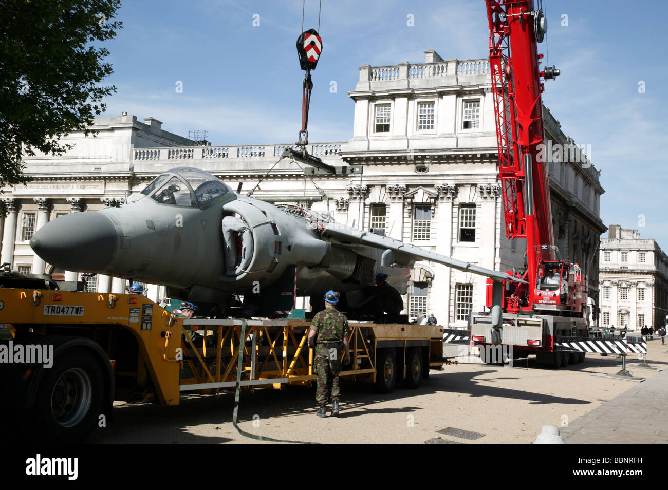 Sea Harrier FA2 being loaded onto a flatbed trailer for transport after ...