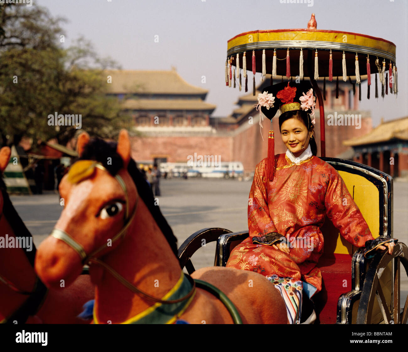 China, Beijing, The Forbidden City, Asian woman in traditional Chinese ...