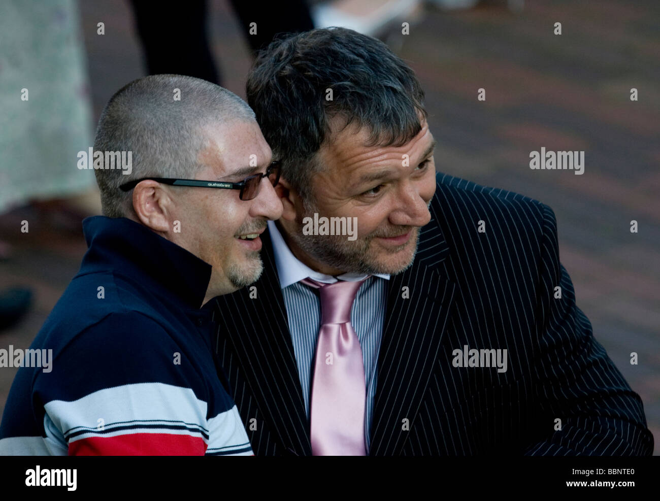 Actor and comedian Smug Roberts posses with a fan at the premier of the ...