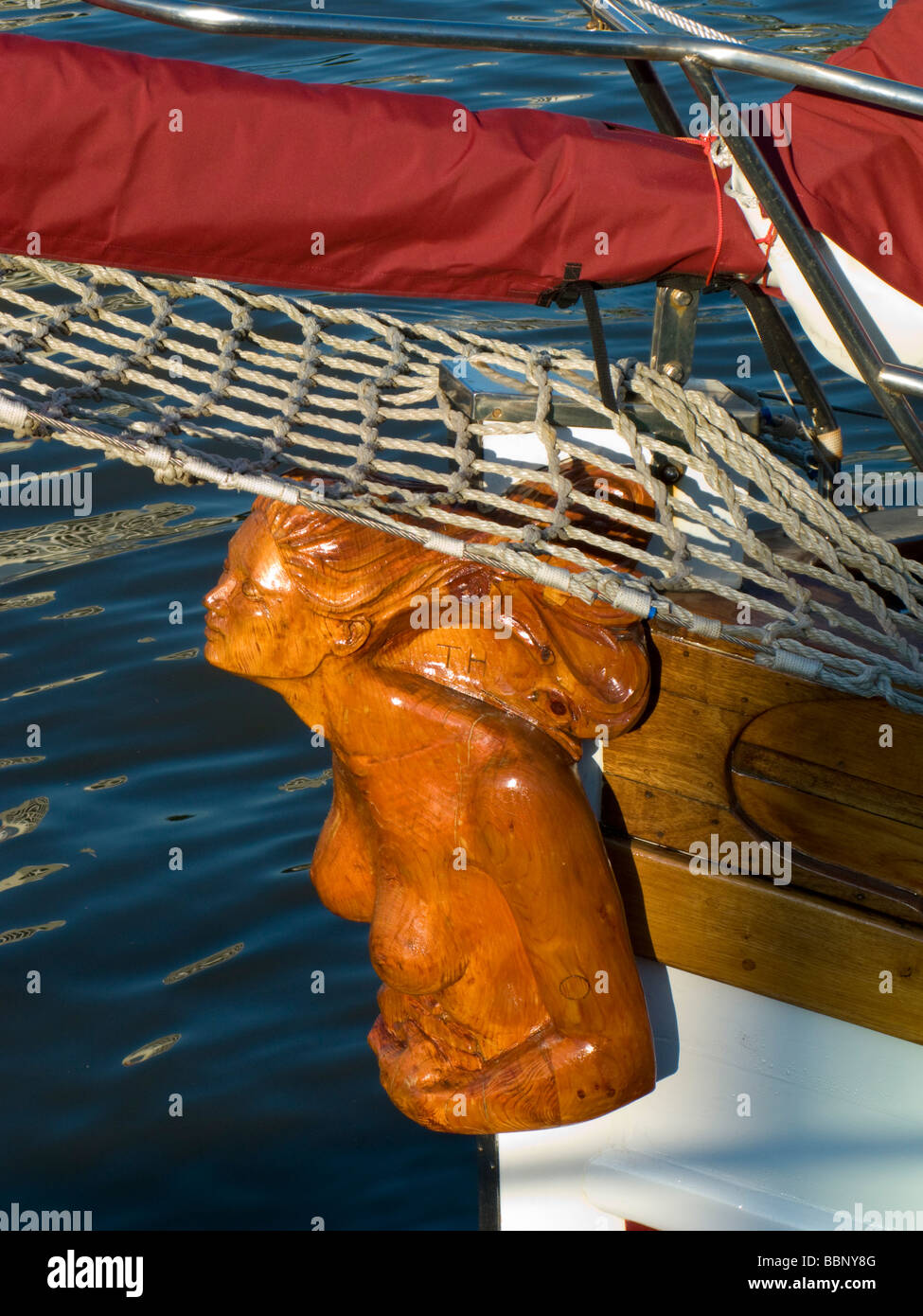 Wooden woman figurehead on prow of boat Stock Photo - Alamy