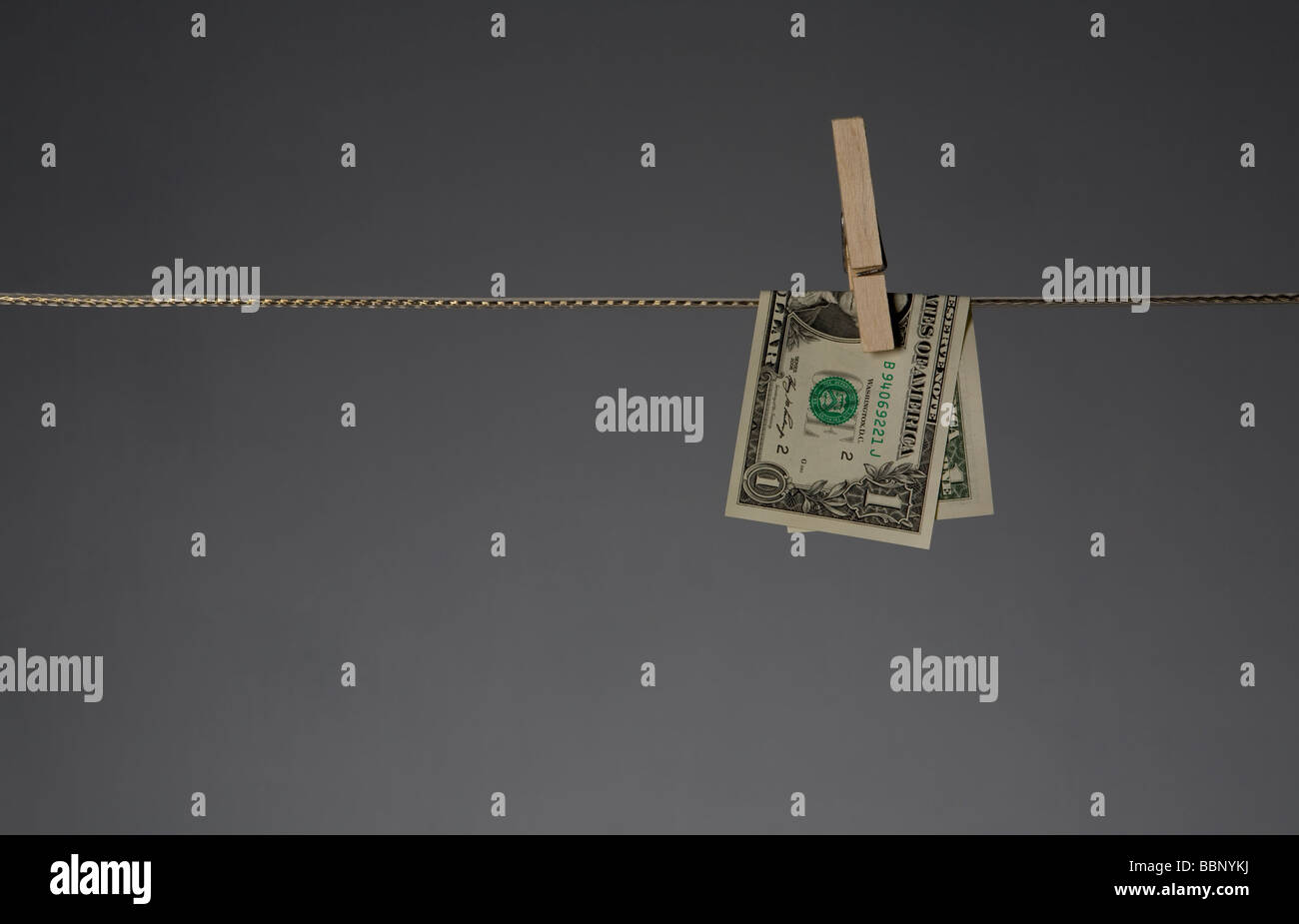 dollar bill on washing line Stock Photo - Alamy