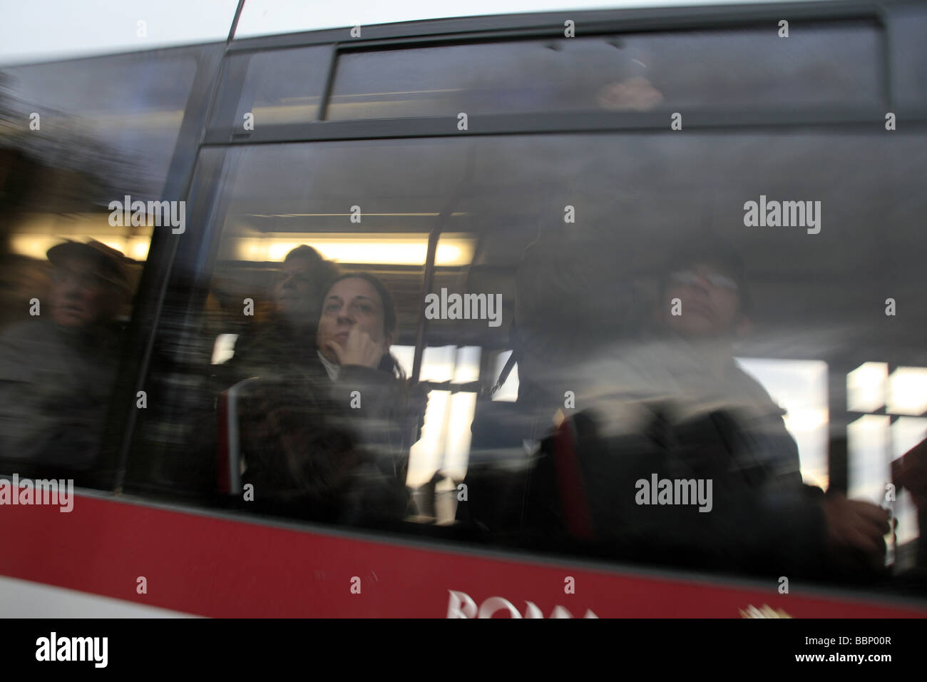 people on fast public transport bus in rome italy Stock Photo - Alamy