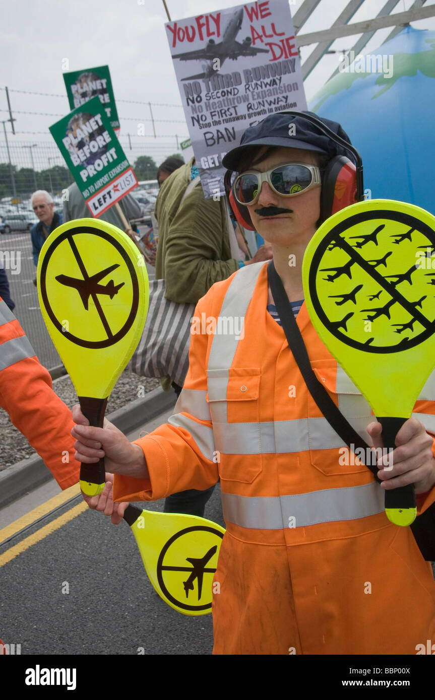 Heathrow - No Third Runway protest march, 31 May 2008. Aircraft marshal ...