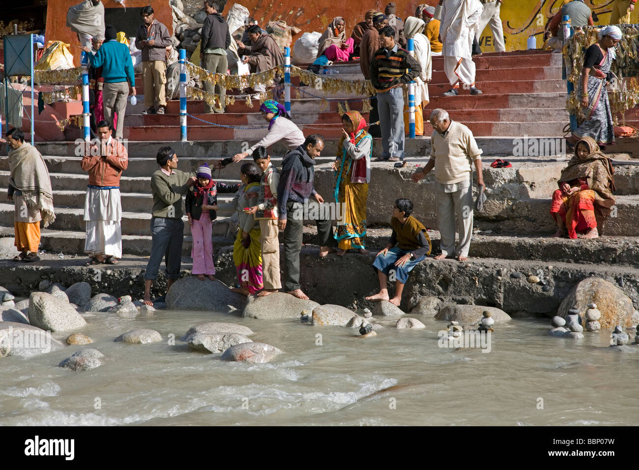 Pilgrims worshiping at the Ganges river. Gangotri. Uttarakhand. India ...