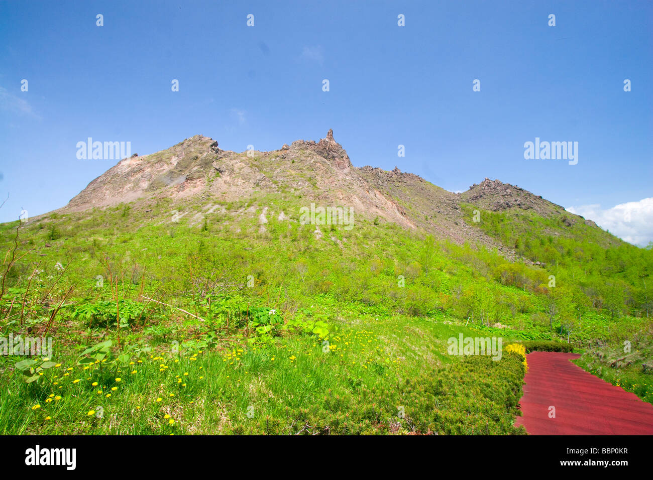 The craggy spires of the summit of Mt Usu zan a still active volcano ...