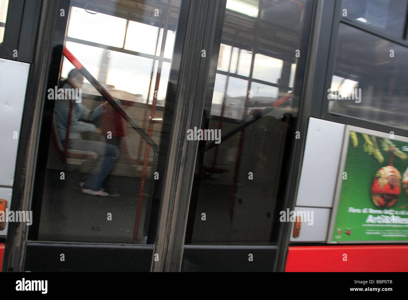 people on fast public transport bus in rome italy Stock Photo - Alamy