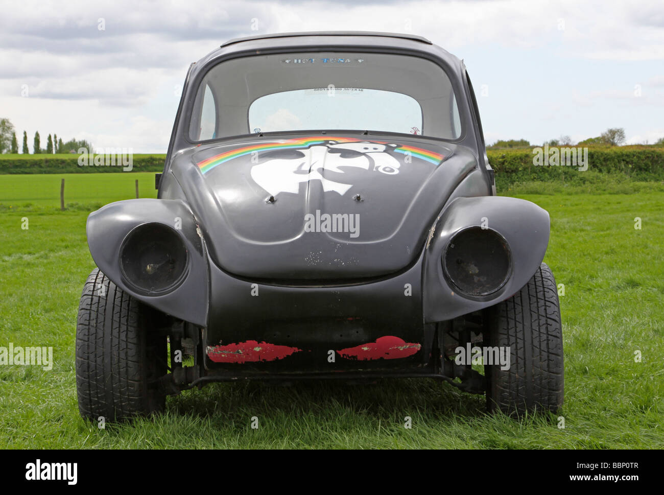 Black VW Beetle in a field Stock Photo - Alamy