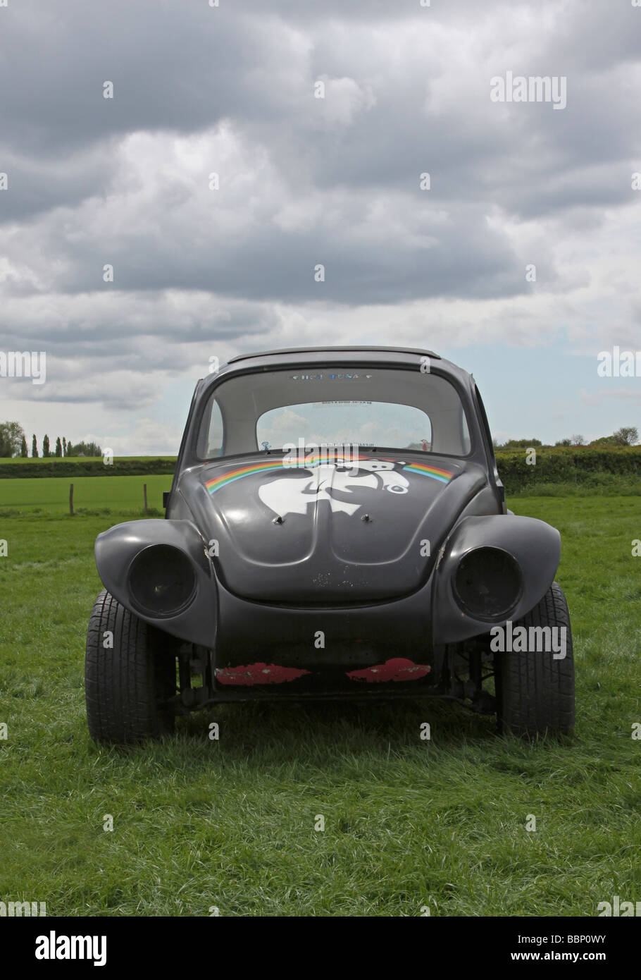 Black VW Beetle in a field Stock Photo - Alamy