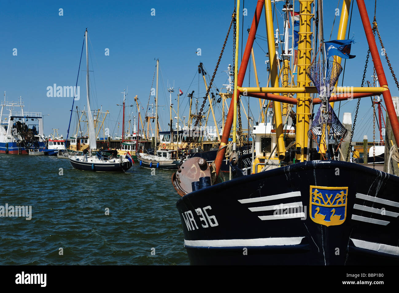 Fishing trawlers in the harbor of Den Oever The Netherlands Stock Photo ...