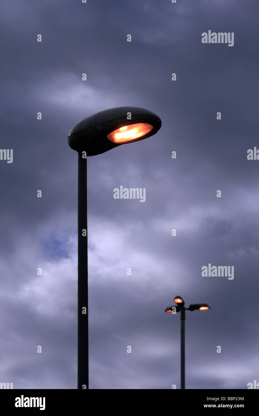 illuminated street lighting system and sky Stock Photo - Alamy