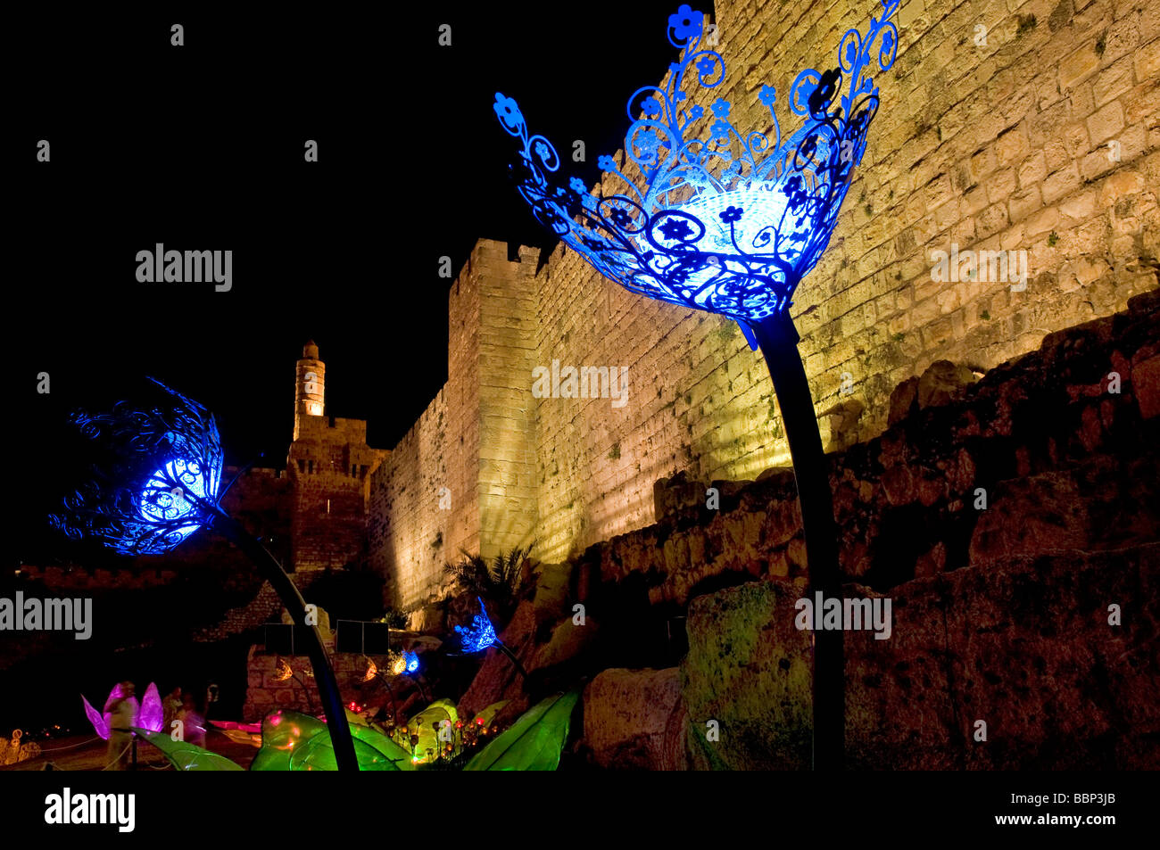 Light art installation placed in front of ancient walls of old city ...