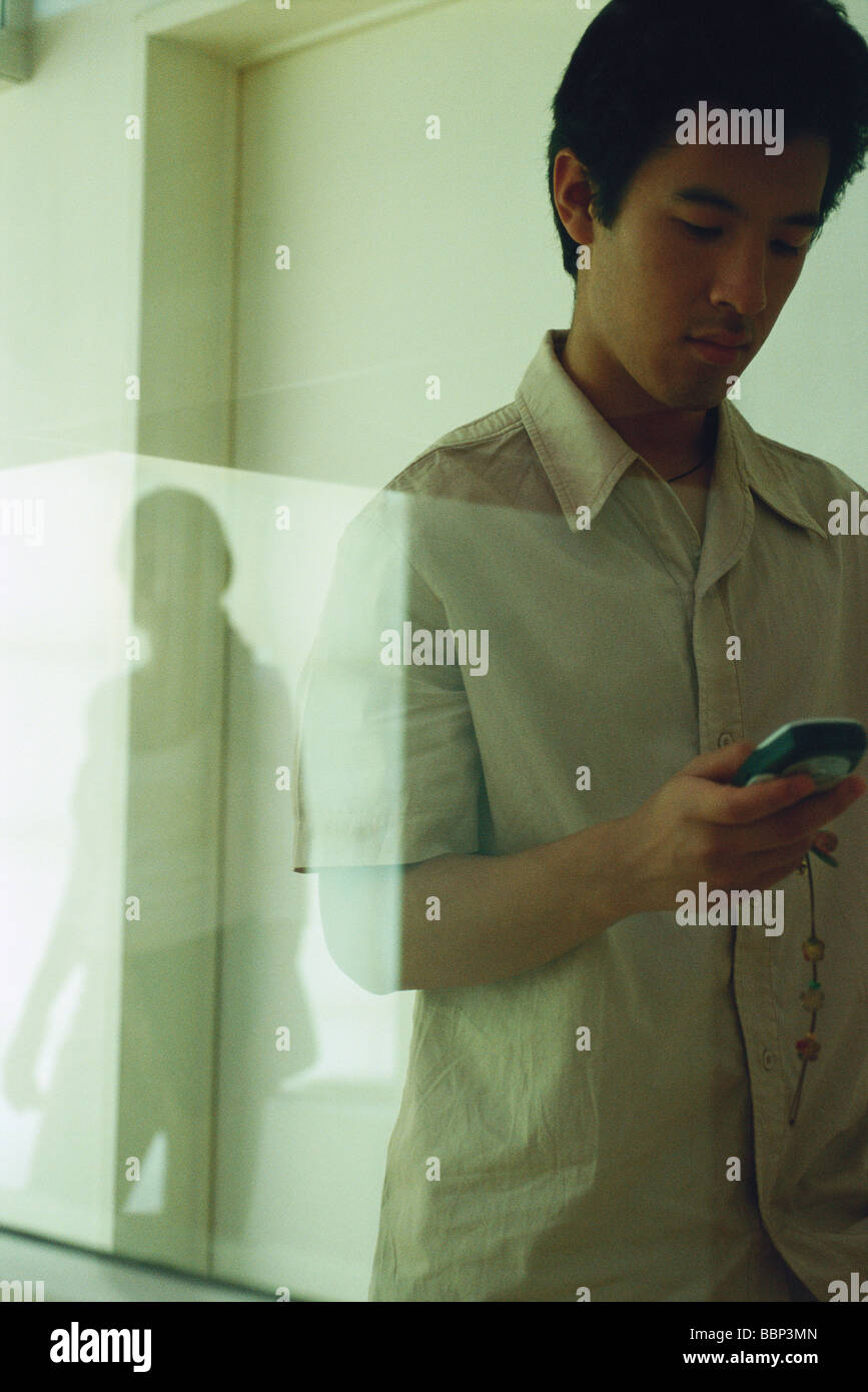 Person reflected in office window hi-res stock photography and images ...