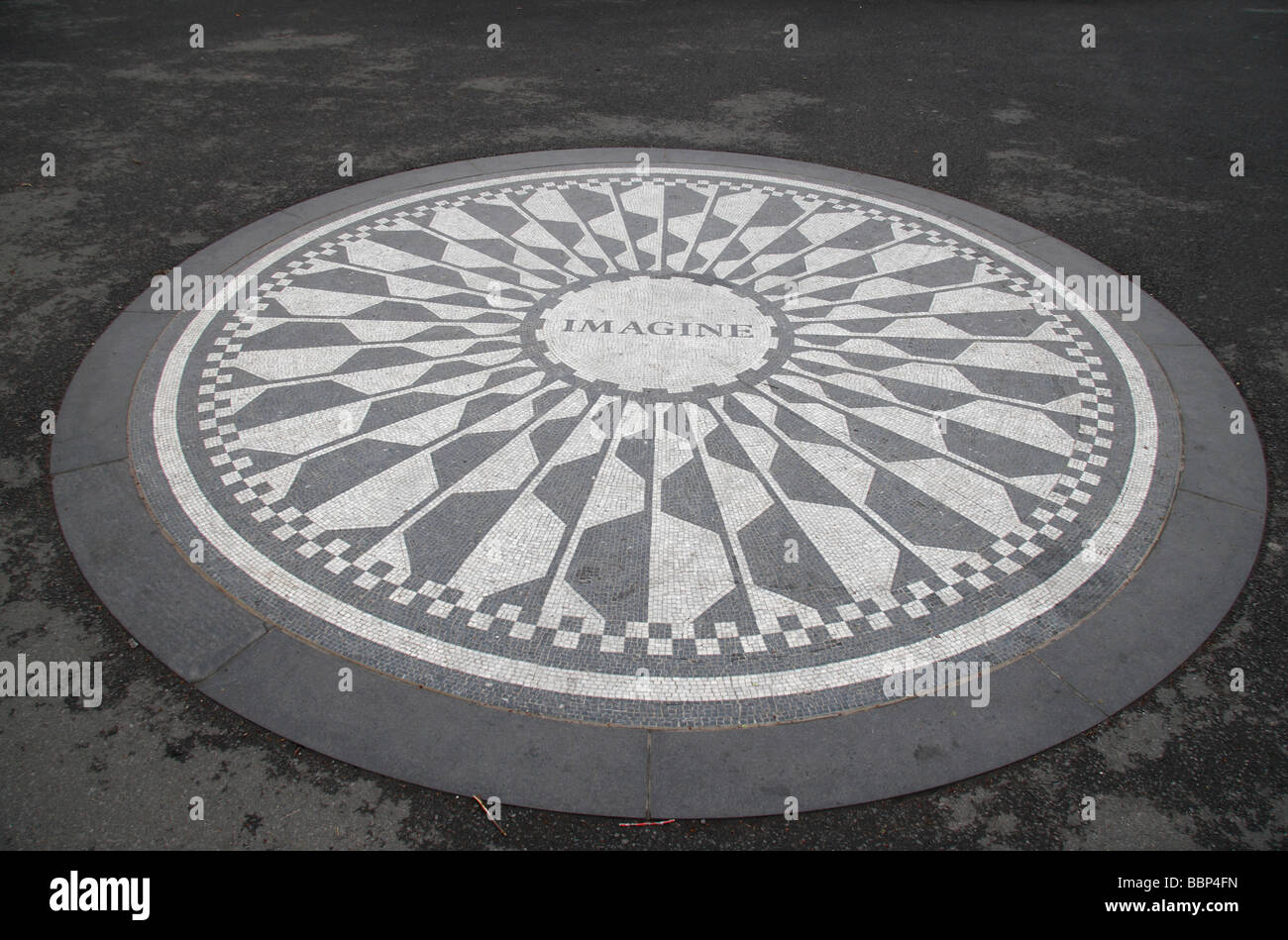 The John Lennon Memorial "Imagine" mosaic in Strawberry Fields, Central ...