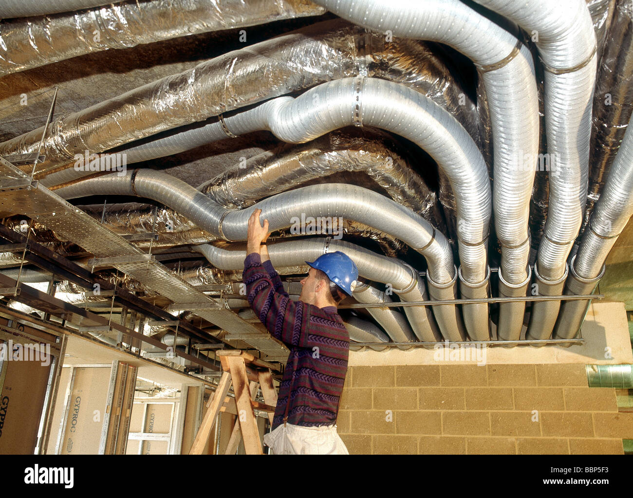 Mechanical services engineer at work Stock Photo - Alamy