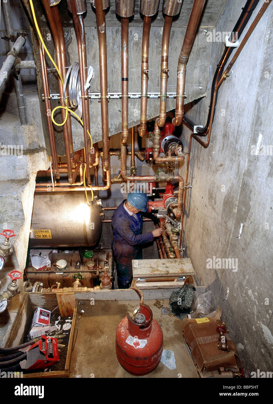 Mechanical services engineer at work Stock Photo - Alamy