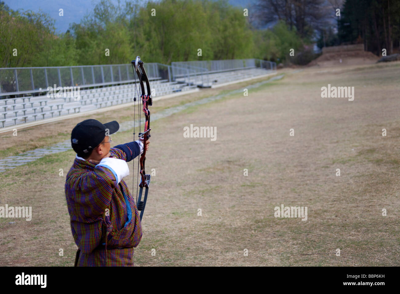 Archer competitor in costume Changlimithang National Sports Stadium, a ...