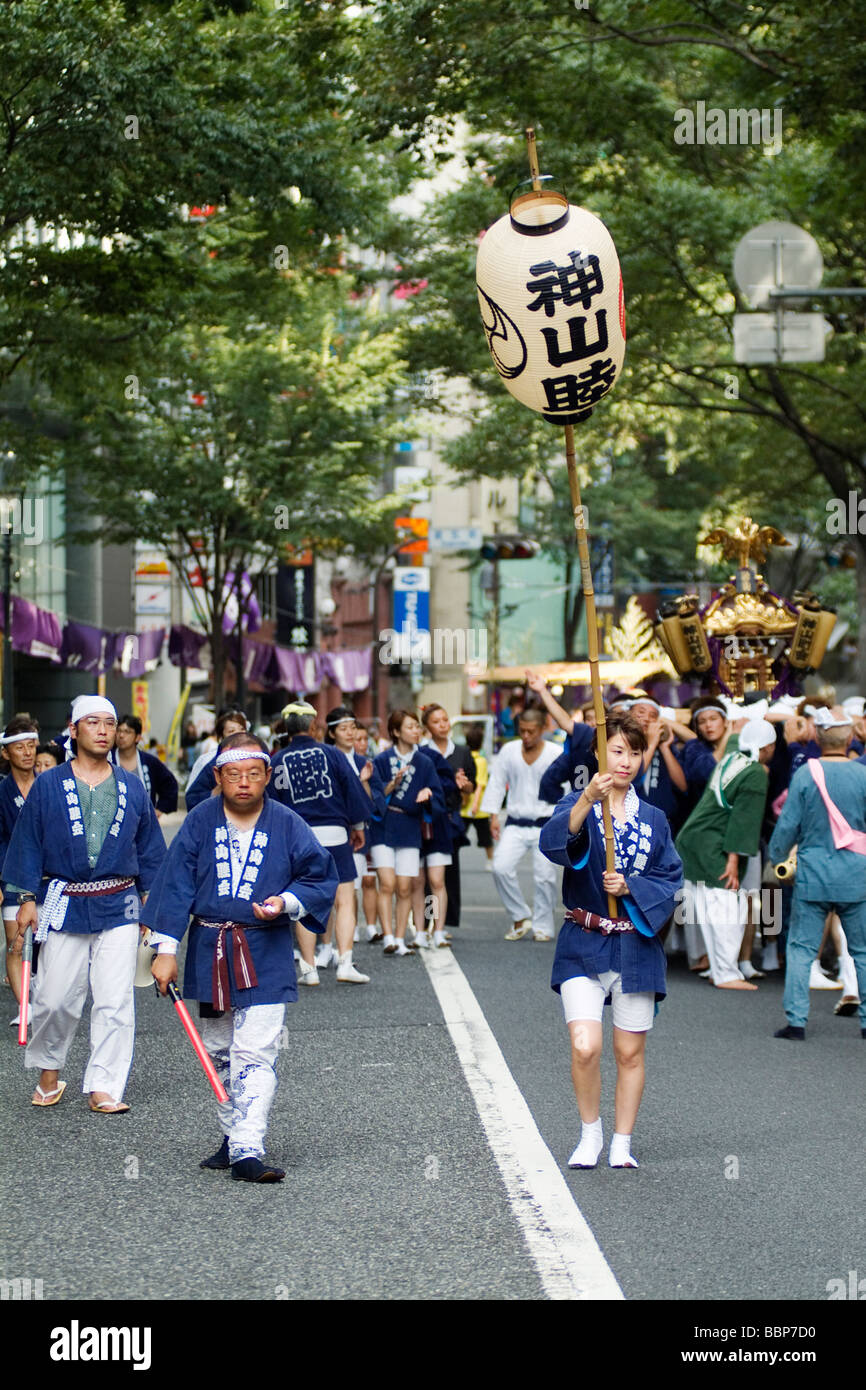 A religious procession on a street in Tokyo, Japan Stock Photo - Alamy