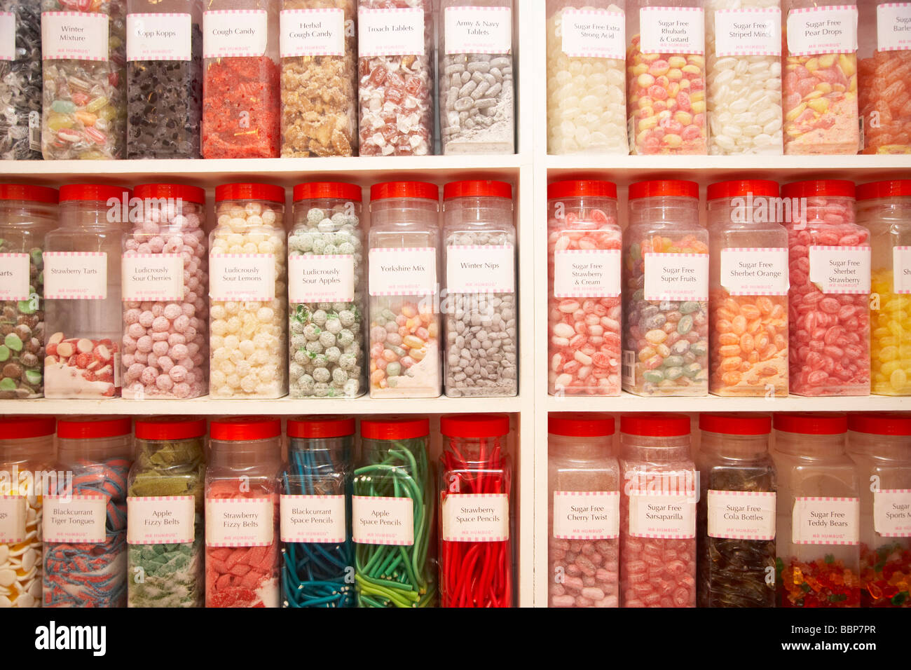 Jars of sweets on display in a shop Stock Photo - Alamy