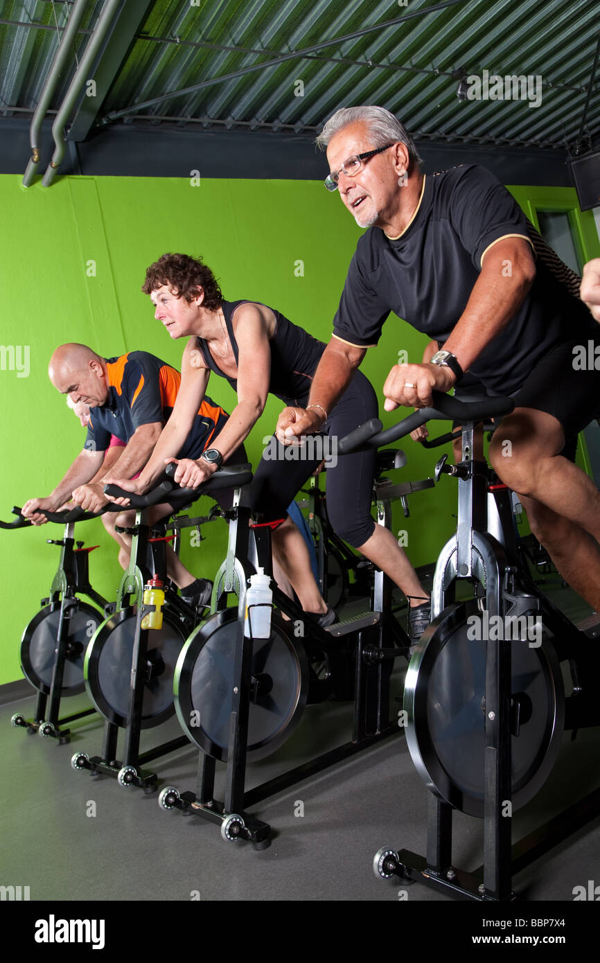 Group of senior people in a cycling class Stock Photo - Alamy