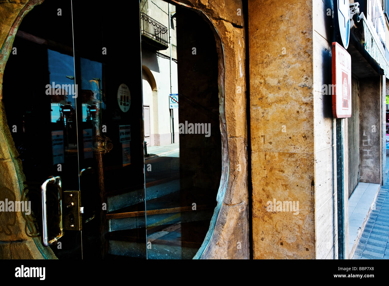 Reflections in the window of a cafe bar in Figueres, Northern Spain ...