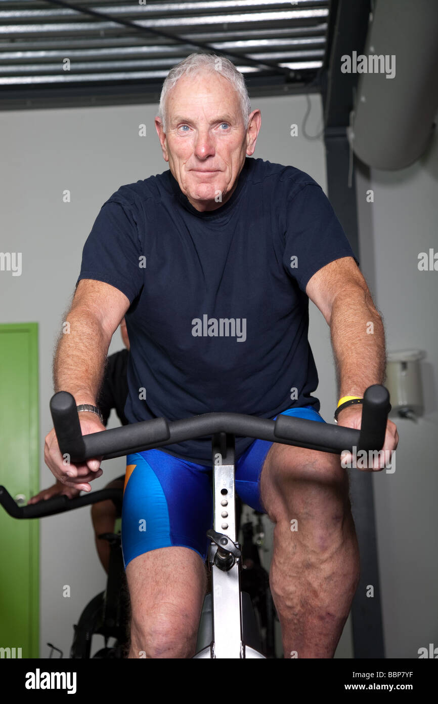 Active senior man in spinning class Stock Photo - Alamy