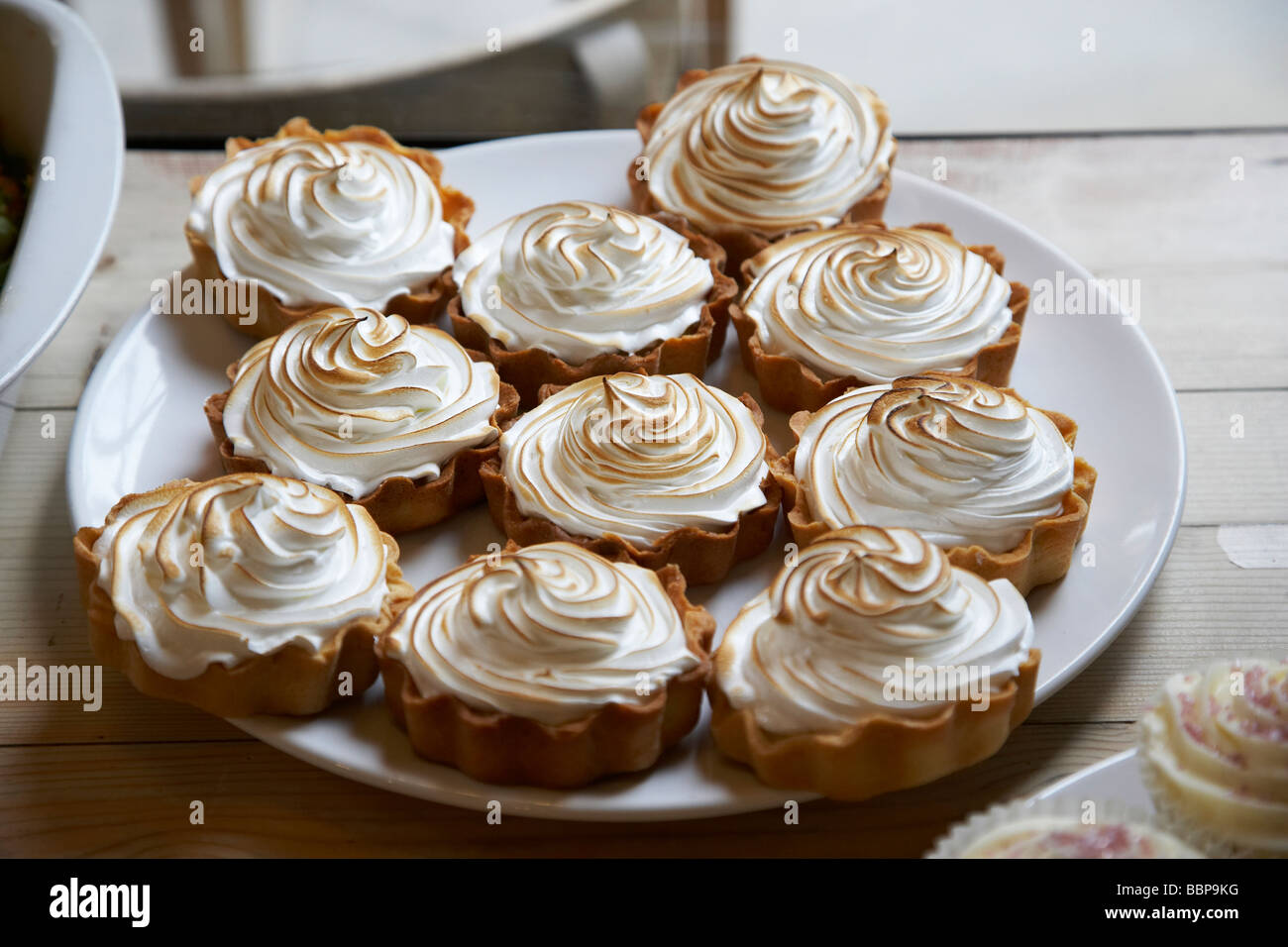 Meringue tart display, on a plate Stock Photo - Alamy