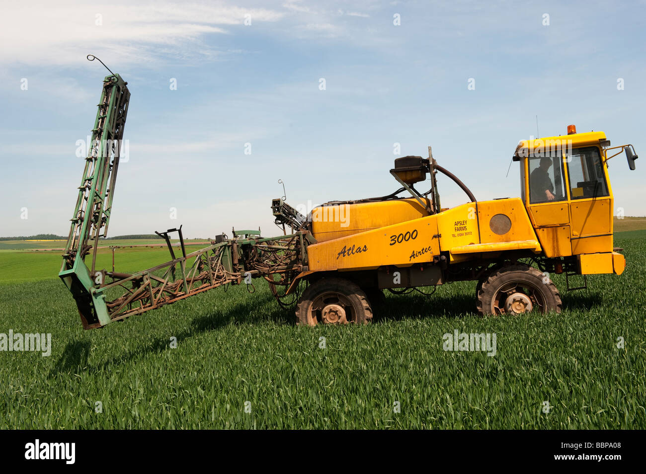 Atlas 3000 self propelled sprayer unfolding boom in preparation to ...