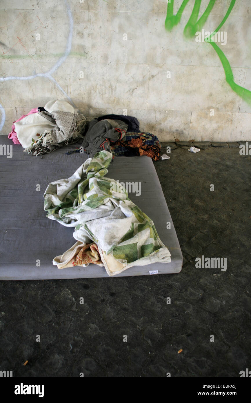 bed of homeless man person under bridge Stock Photo - Alamy