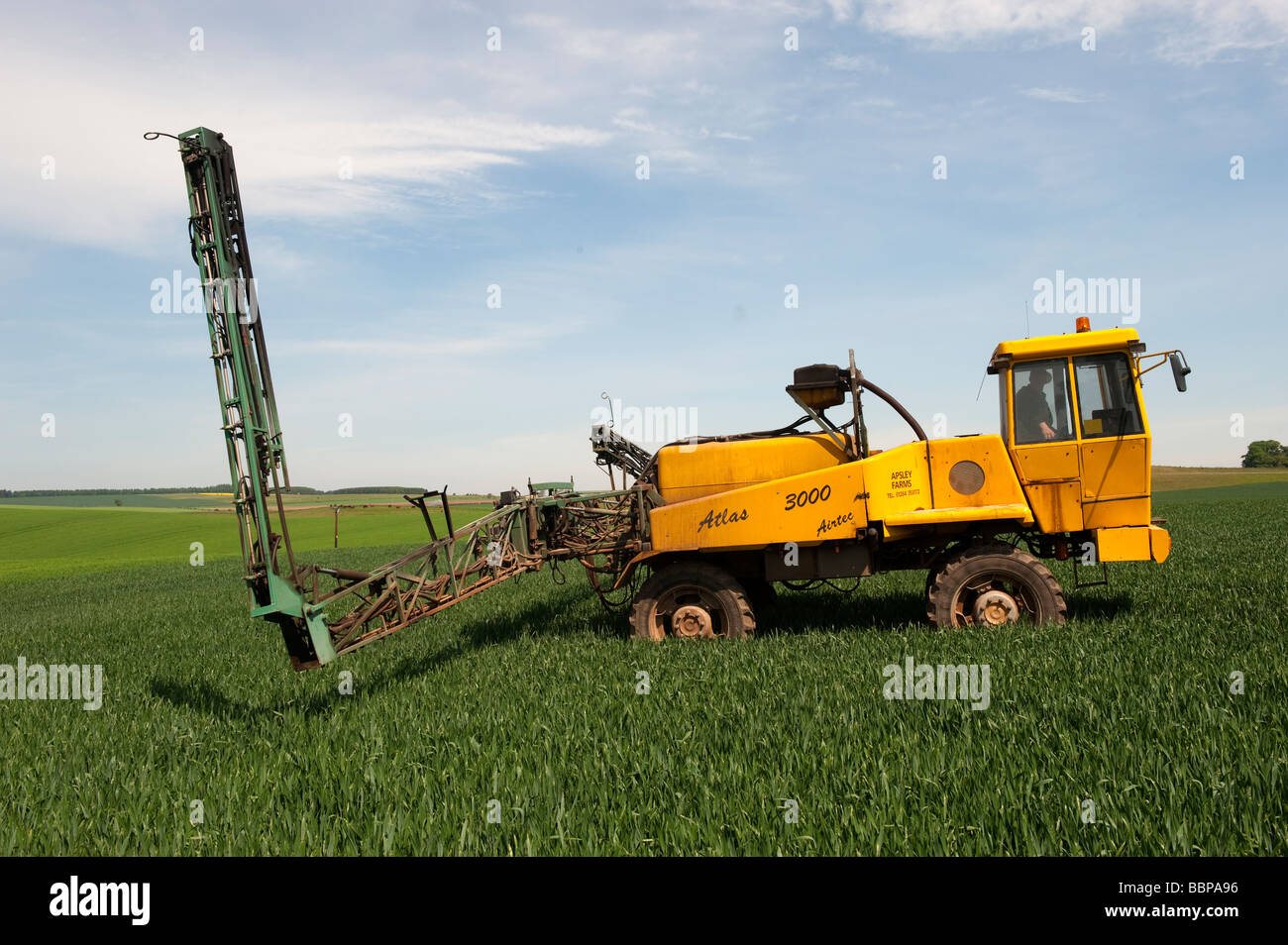 Atlas 3000 self propelled sprayer unfolding boom in preparation to ...