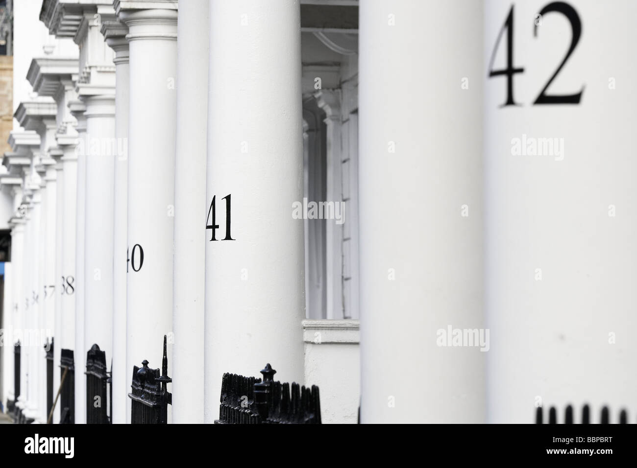 House numbers painted on columns in a London street Stock Photo - Alamy